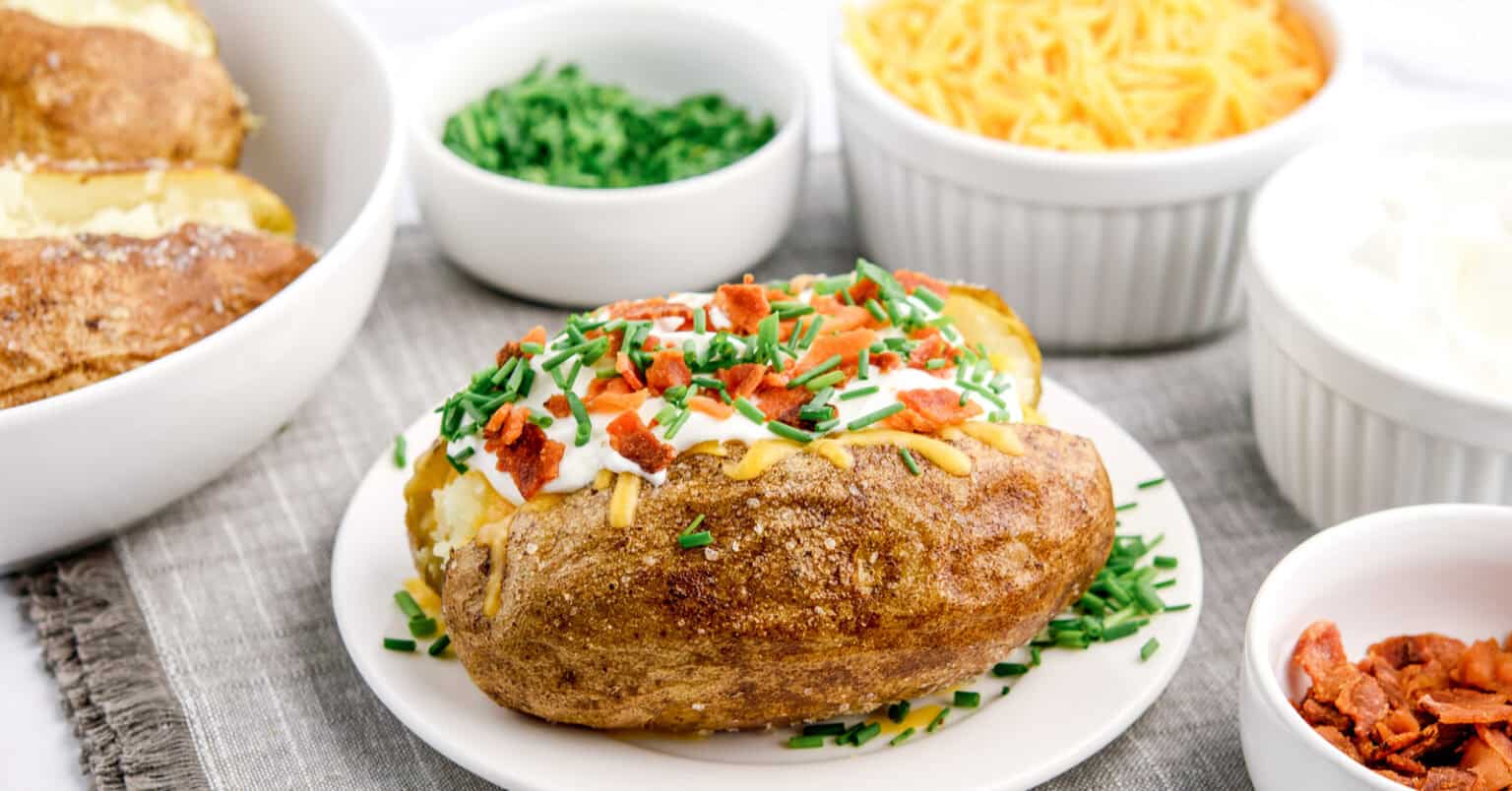 75+ Baked Potato Toppings for a Potato Bar- w/ Free Printable List!