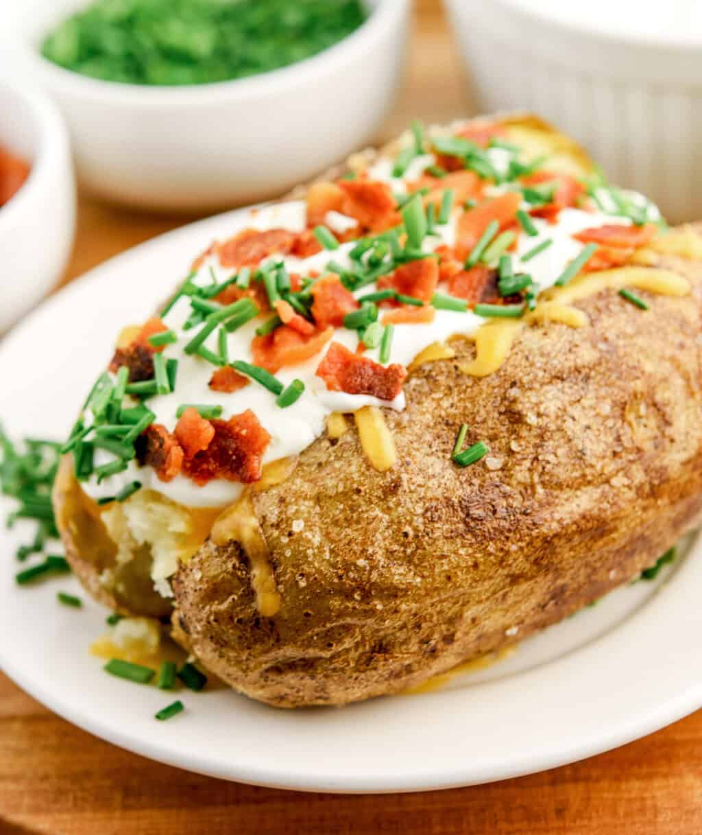 75+ Baked Potato Toppings for a Potato Bar- w/ Free Printable List!